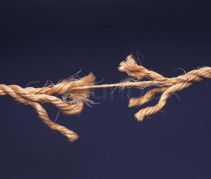 Frayed rope about to break isolated on ... | Stock image | Colourbox