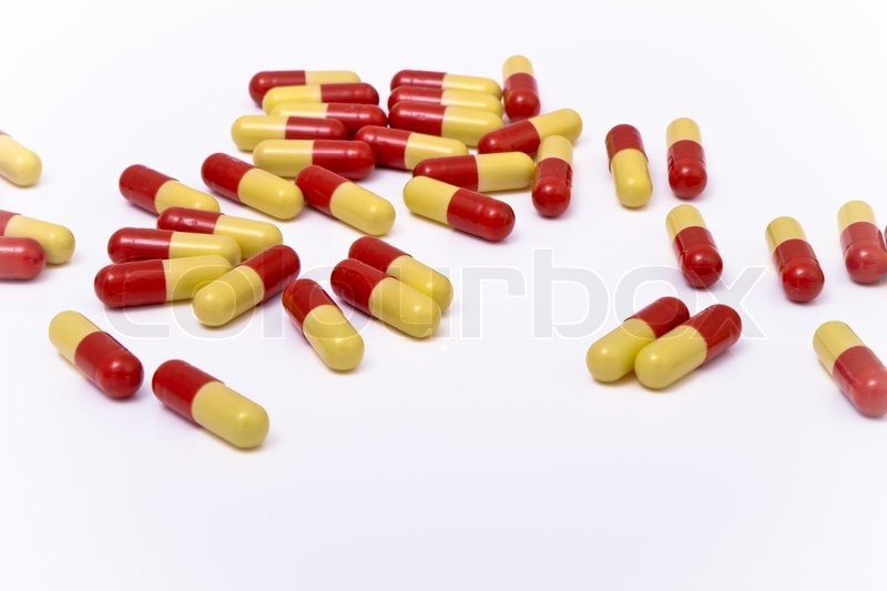 Colorful capsules on white background | Stock image | Colourbox