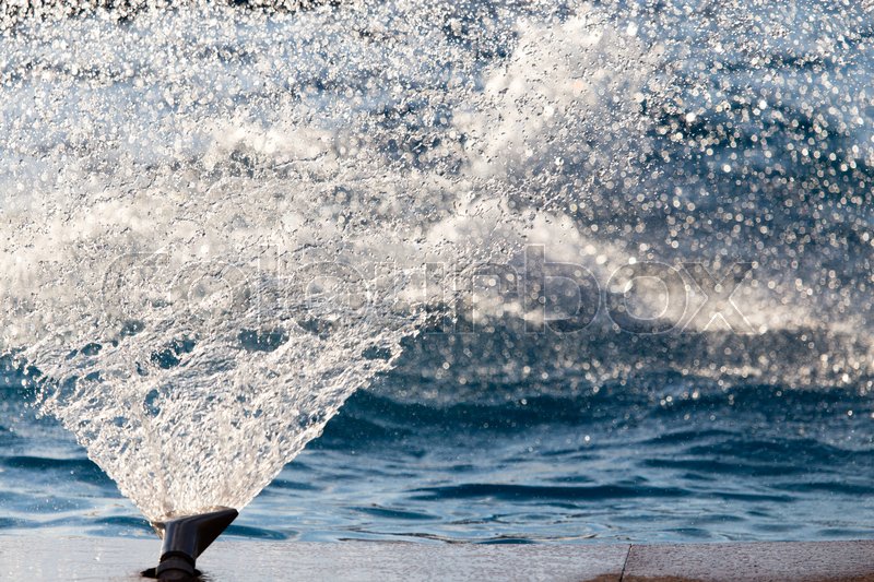 Splashing water in the pool as a ... | Stock image | Colourbox