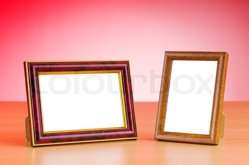 Photo frames on the table | Stock image | Colourbox