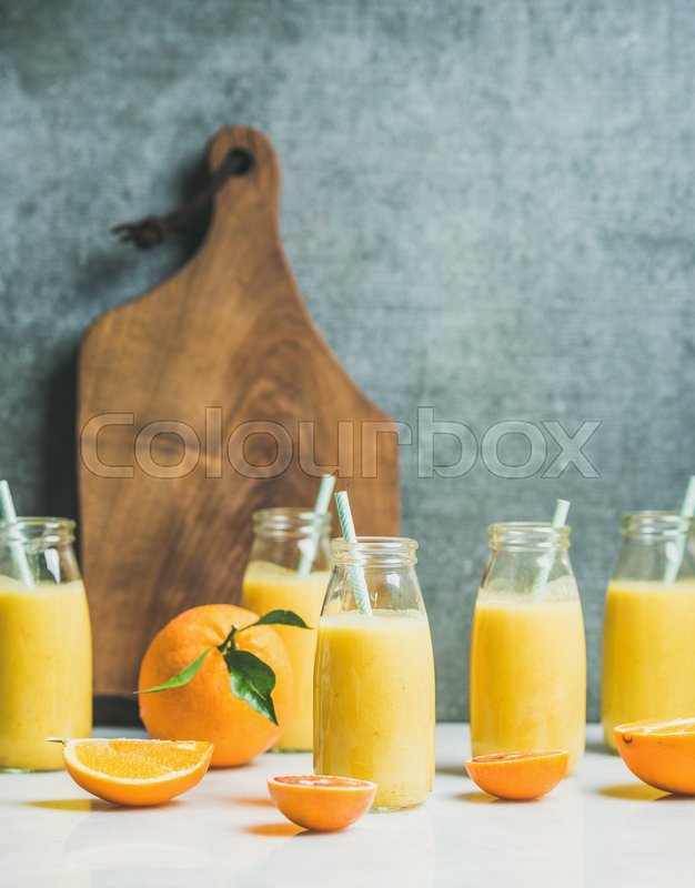 Healthy yellow smoothie with citrus ... | Stock image | Colourbox