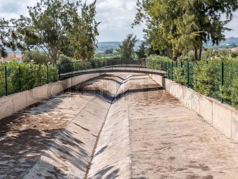 Dry river with no water. Small bridge ... | Stock image | Colourbox