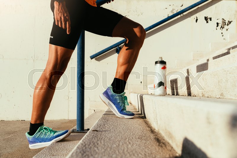 Close up of legs stretching. Fitness, ... | Stock image | Colourbox