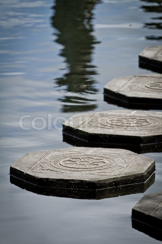Stone steps floating on the water, ... | Stock image | Colourbox