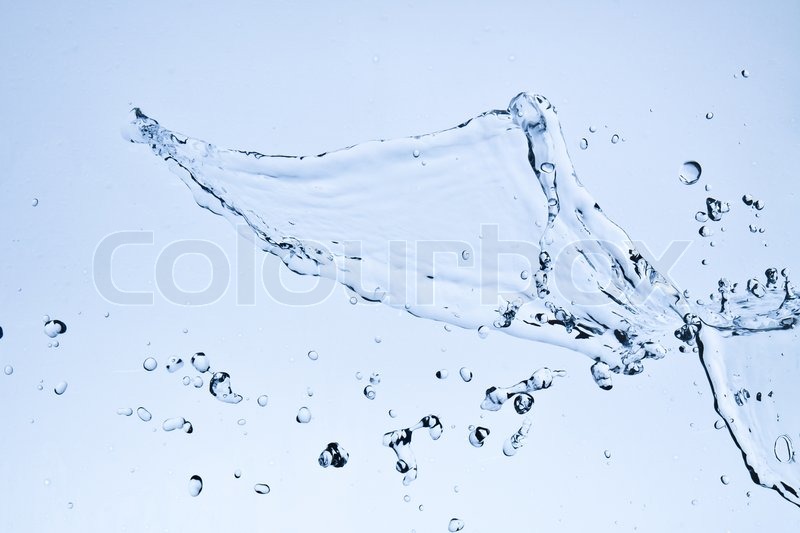 Water splash close up shot on blue ... | Stock Photo | Colourbox