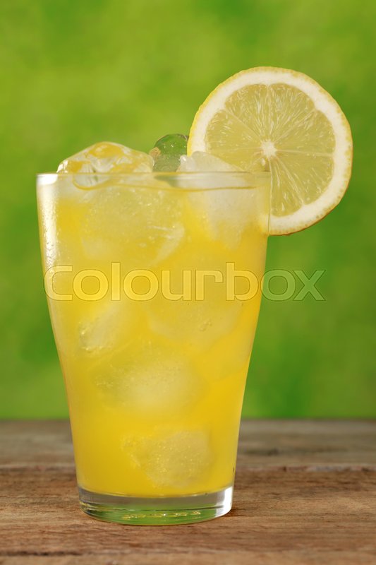 Cold lemonade in a glass with ice ... | Stock image | Colourbox