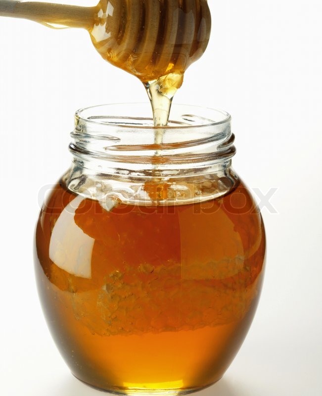 Glas Honig mit Holz drizzler auf weißem ... | Stock Bild | Colourbox