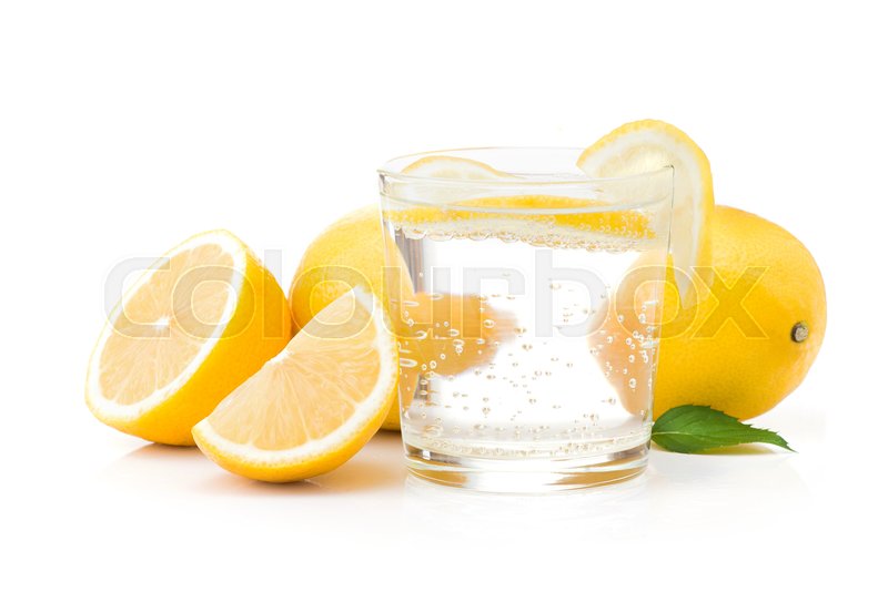 Fresh lemon water in glass isolated on ... | Stock image | Colourbox