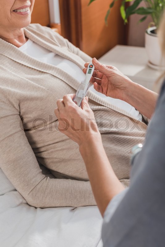 Cropped shot of nurse measuring ... | Stock image | Colourbox