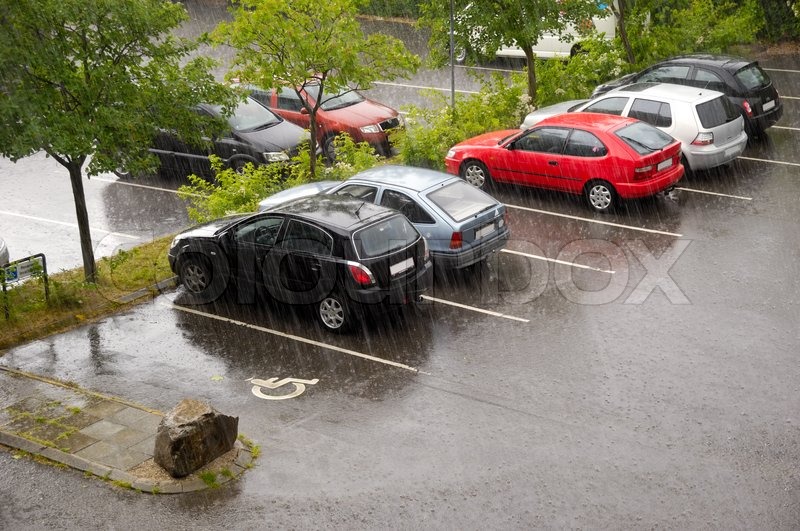 Parked cars in rain | Stock image | Colourbox