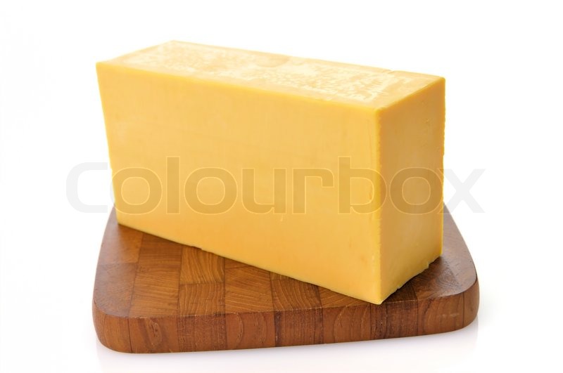 A Bar Of Sharp Cheddar Cheese On A ... | Stock Photo | Colourbox