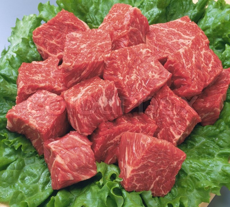 Raw fresh meat sliced in cubes | Stock image | Colourbox