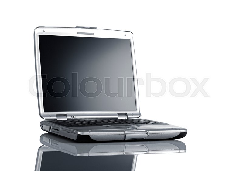 Open Laptop on a desk with relfection | Stock image | Colourbox