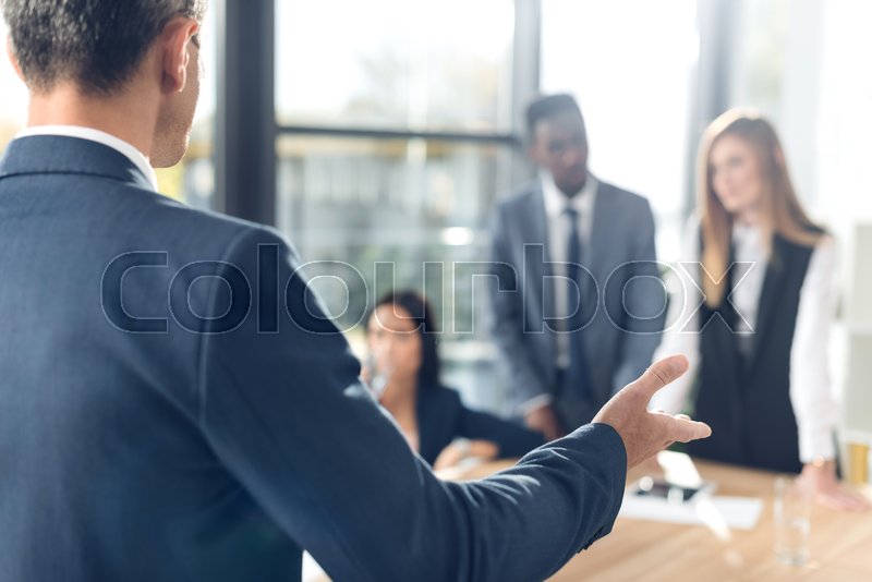 Cropped shot of businessman talking to ... | Stock image | Colourbox