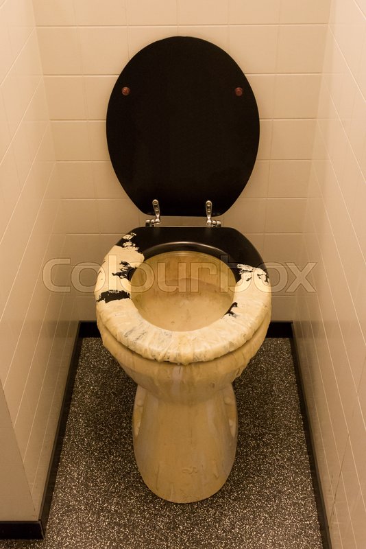 Dirty toilet, in need of a toilet brush ... | Stock image | Colourbox