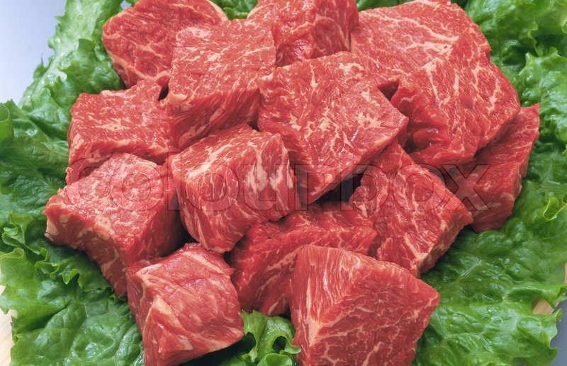 Raw fresh meat sliced in cubes | Stock image | Colourbox