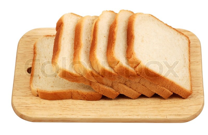 Toast bread on a cutting board isolated ... | Stock image | Colourbox
