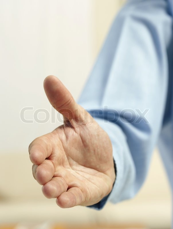 Ein Business-Mann mit einer offenen Hand ... | Stock Bild | Colourbox