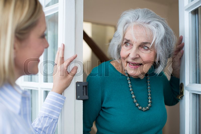 Woman Checking On Elderly Female ... | Stock image | Colourbox