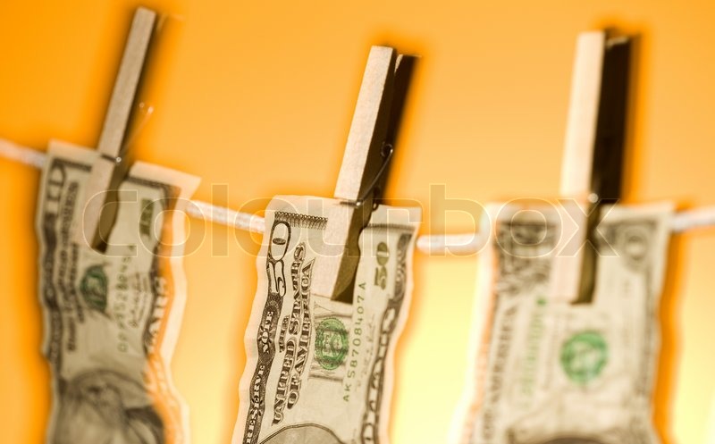 Close-up of money hanging on a clothes ... | Stock image | Colourbox