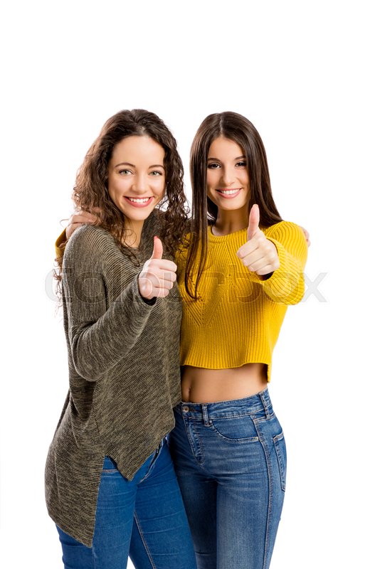 Studio portrait of two beautiful girls ... | Stock image | Colourbox