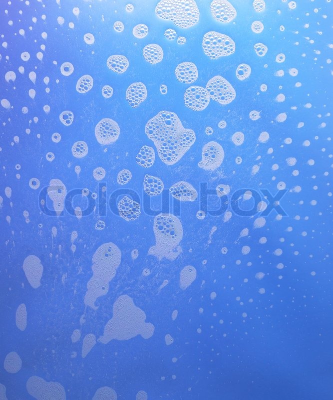 Abstract wet blue background with soap ... | Stock image | Colourbox