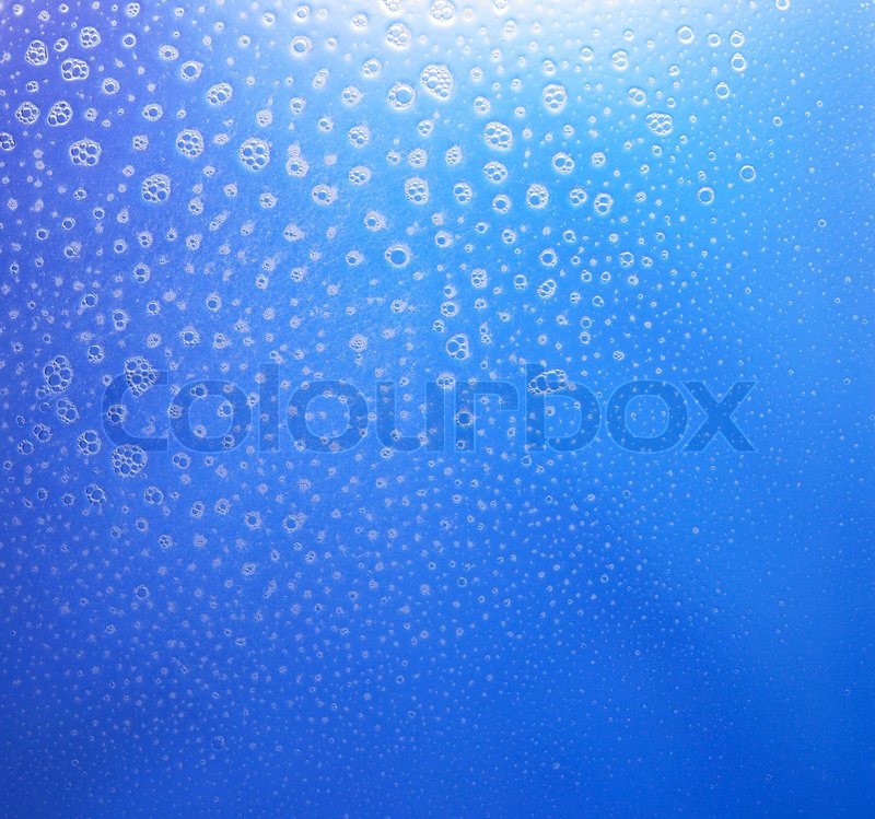 Abstract wet blue background with soap ... | Stock image | Colourbox