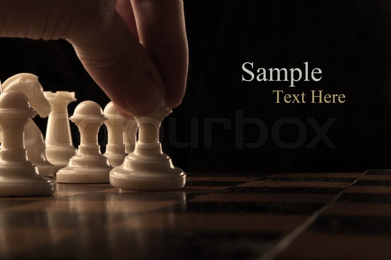 Man plays chess and makes the first ... | Stock image | Colourbox