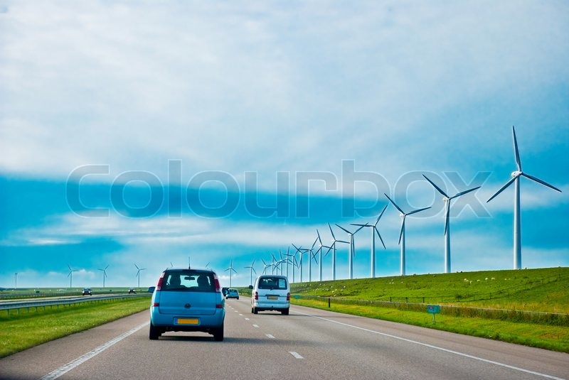 Cars on a highway with wind turbines | Stock image | Colourbox