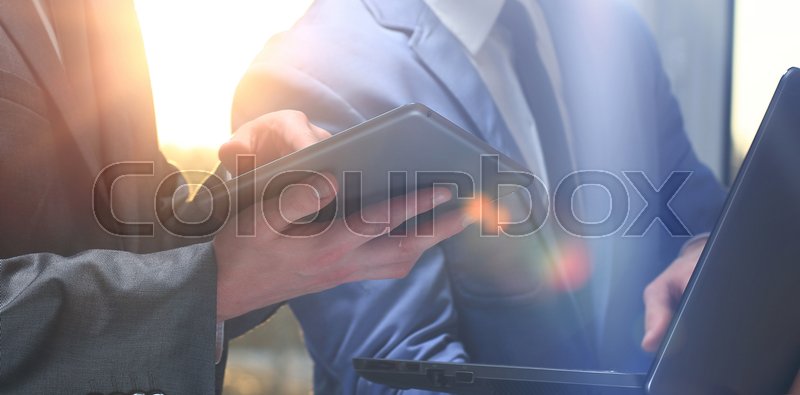 Business people working with digital ... | Stock image | Colourbox