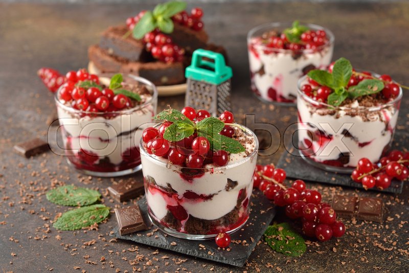 Chocolate dessert with red currant on a ... | Stock image | Colourbox