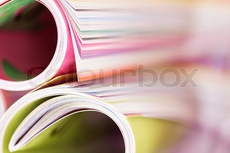 Close up edge of colorful magazine ... | Stock image | Colourbox
