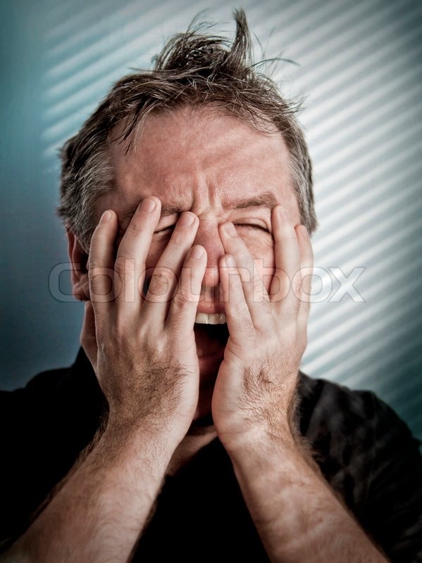 Man crying real tears In a bad case of depression | Stock Photo | Colourbox