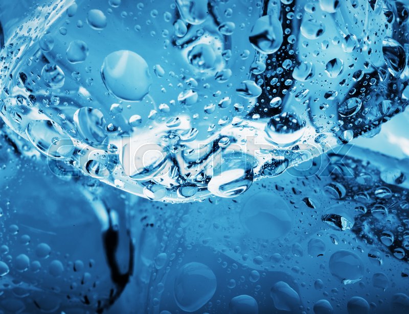 Drops on an ice cube shot close-up. Ice ... | Stock image | Colourbox
