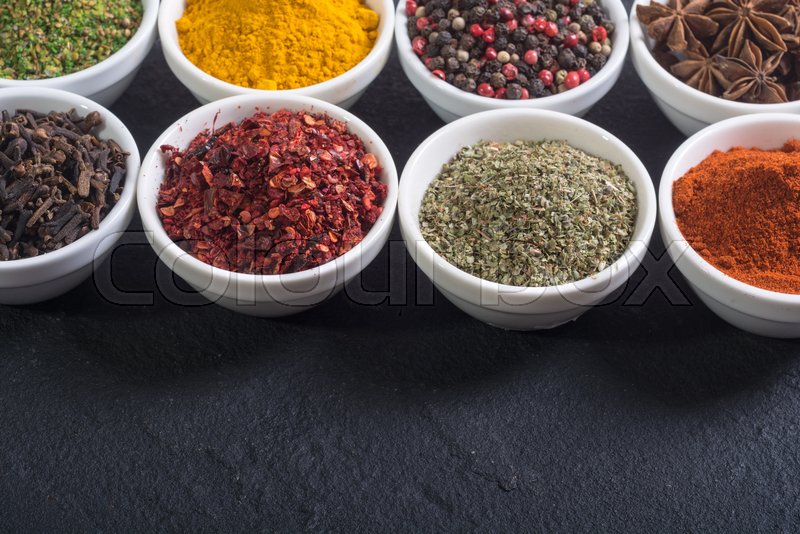 Collection of indian spices in bowl ... | Stock image | Colourbox