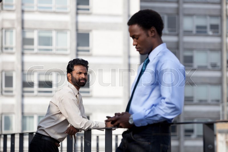 Two businessmen thinking before work | Stock image | Colourbox