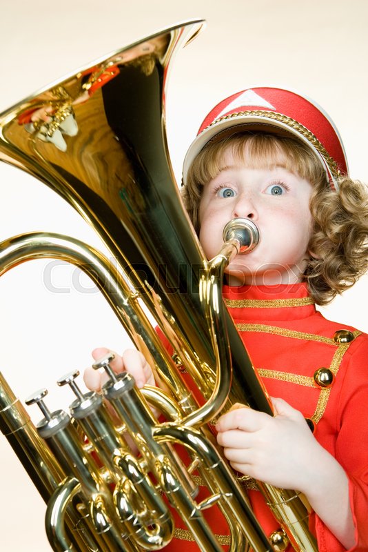 Portrait of a girl playing the tuba | Stock image | Colourbox