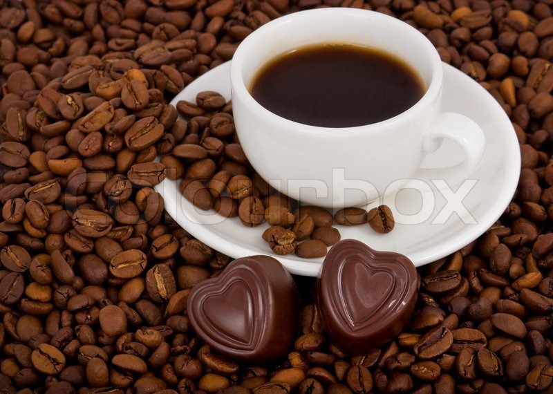 En kop kaffe og chokolade i form af ... | Stock foto | Colourbox
