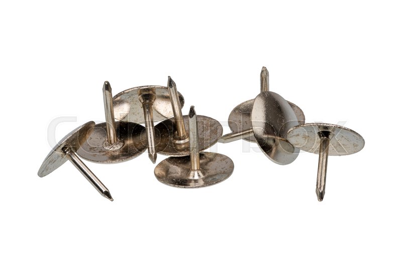 Group of metal thumb tacks isolated on ... | Stock image | Colourbox