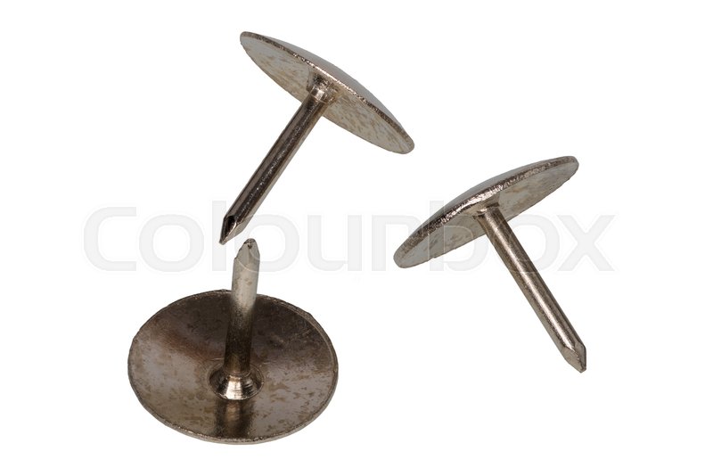 Group of metal thumb tacks isolated on ... | Stock image | Colourbox