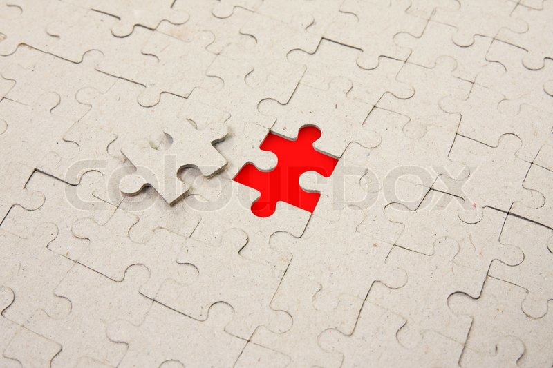 Papper puzzle background with one red ... | Stock Photo | Colourbox