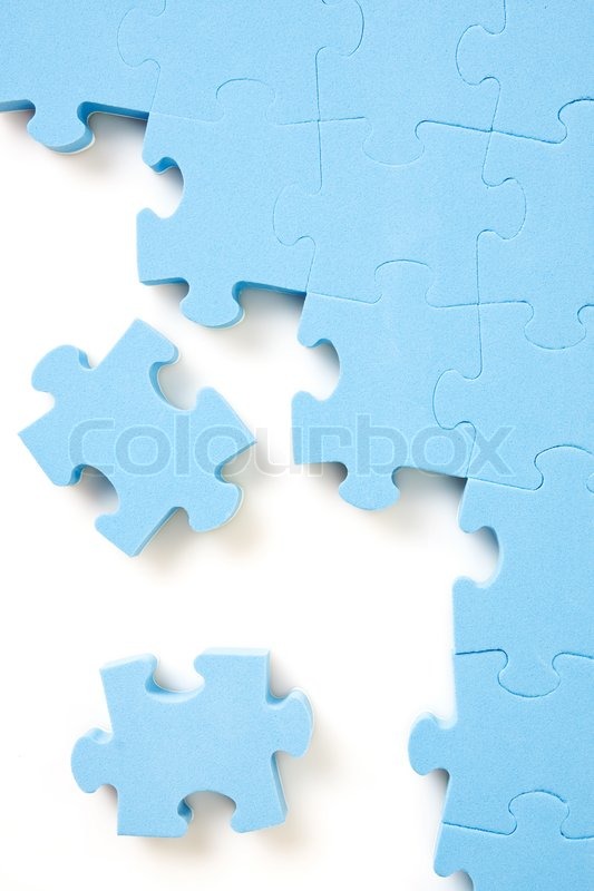 Blue jigsaw puzzle pieces on white ... | Stock image | Colourbox