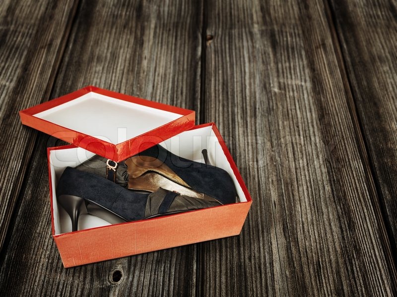 Woman shoes in the red box on the floor | Stock image | Colourbox