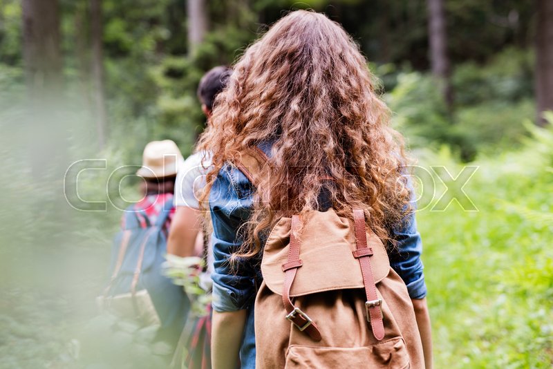 Teenagers with backpacks hiking in ... | Stock image | Colourbox