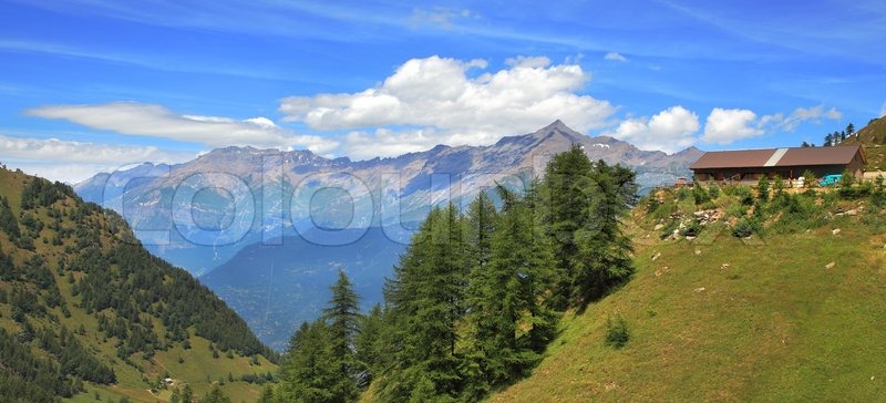 Panoramic view on alpine hills and ... | Stock image | Colourbox