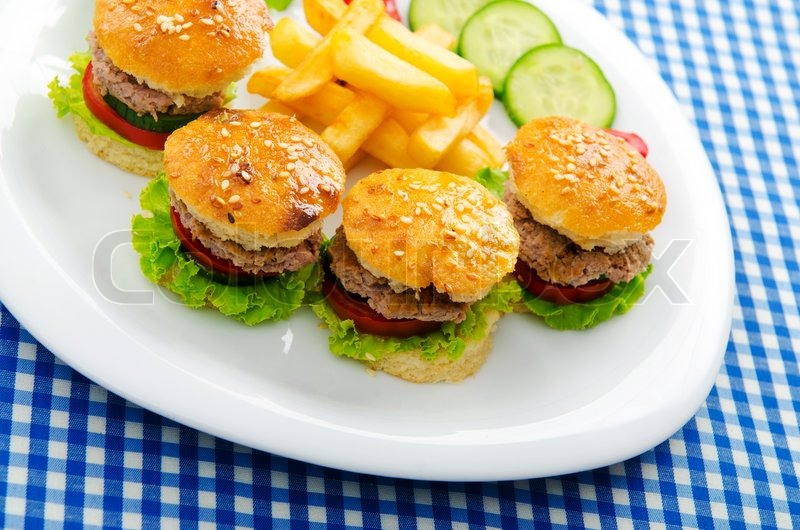 Plate with tasty mini burgers | Stock image | Colourbox