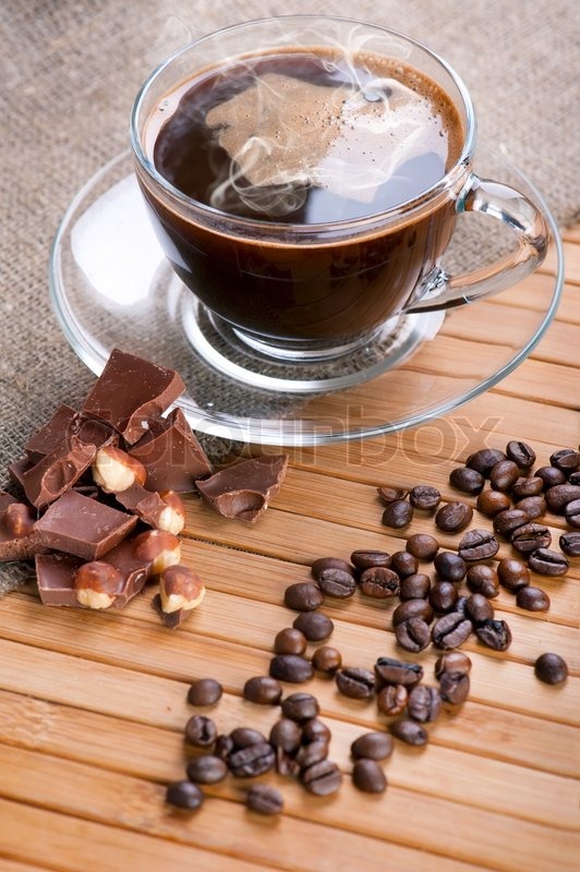 Cup of coffee, chocolate with nuts and ... | Stock image | Colourbox