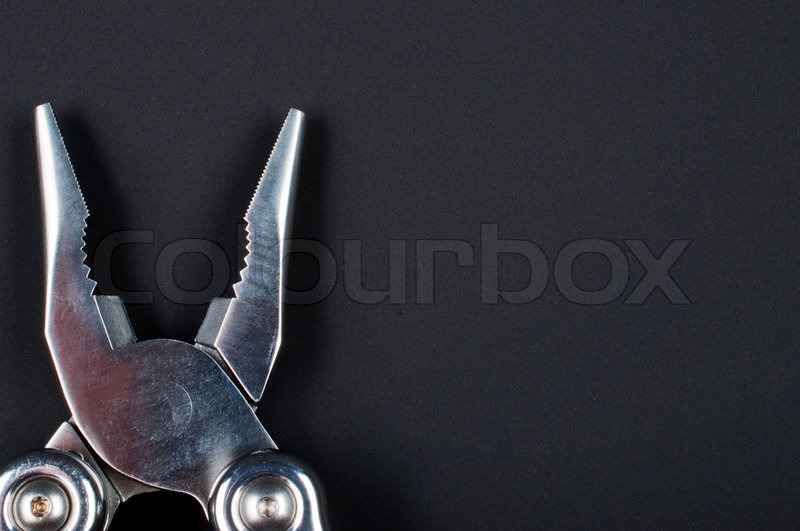 Nahaufnahme einer Zange auf schwarzem ... | Stock Bild | Colourbox