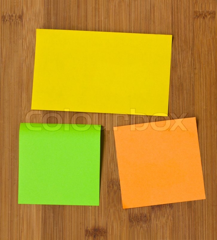 Three multicolored post it notes on ... | Stock image | Colourbox
