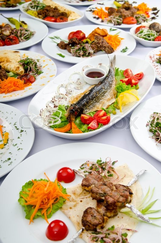 Lots of meals served on table | Stock image | Colourbox